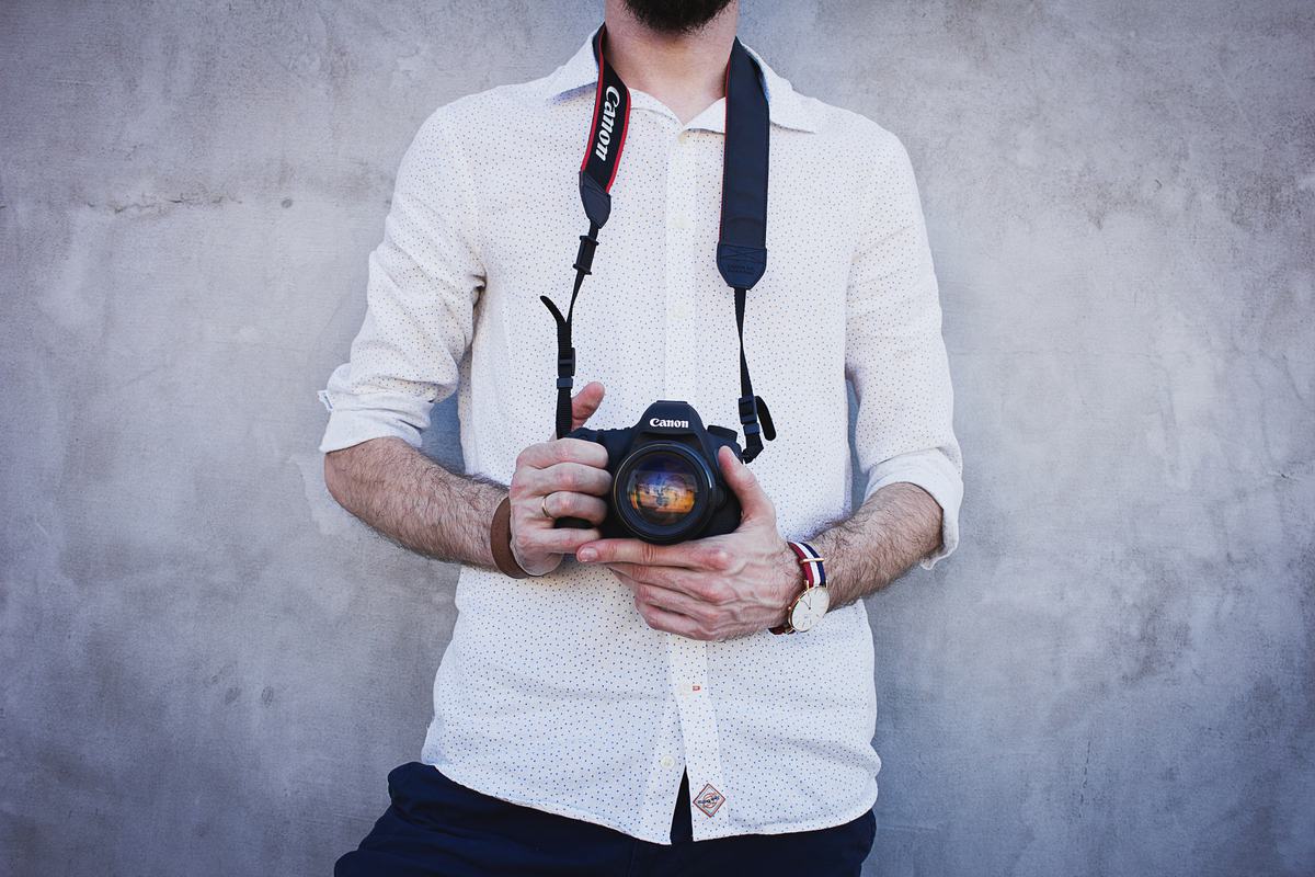 Free Photo: Man Standing with Camera