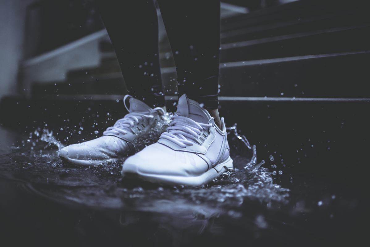 Free Photo: White Sneakers Splashing in Puddle