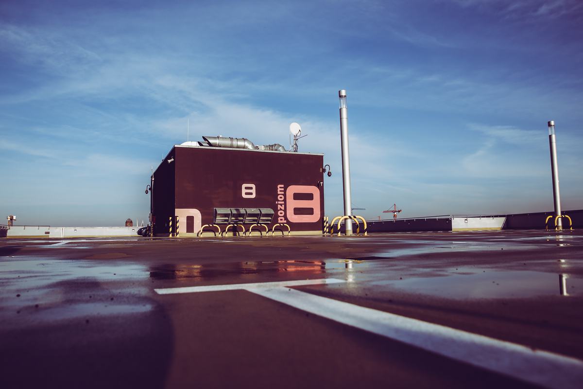 Free Photo: Wet Rooftop Parking