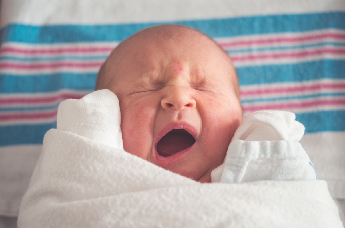 Free Photo: Newborn Baby Crying with Closed Eyes