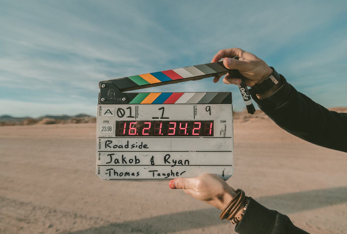 Free Photo: Hands Holding Movie Clapper During the Production of Film ...