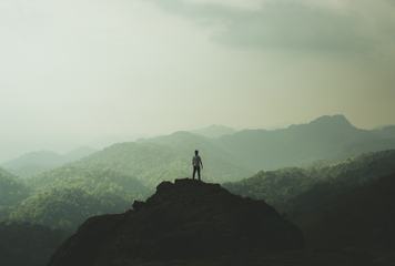 Free Photo: Male Hiker on a Rock Looking Down at a Valley