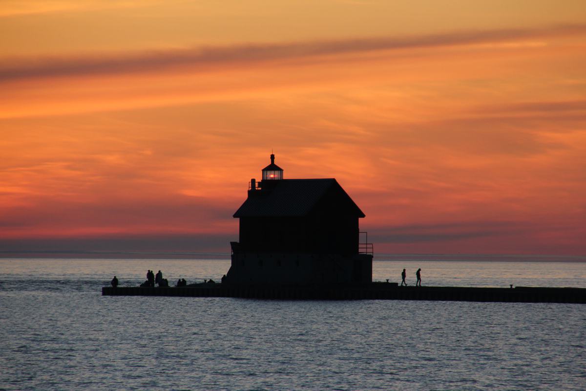 Free Photo: Lighthouse Seen from a Beach at Sunset