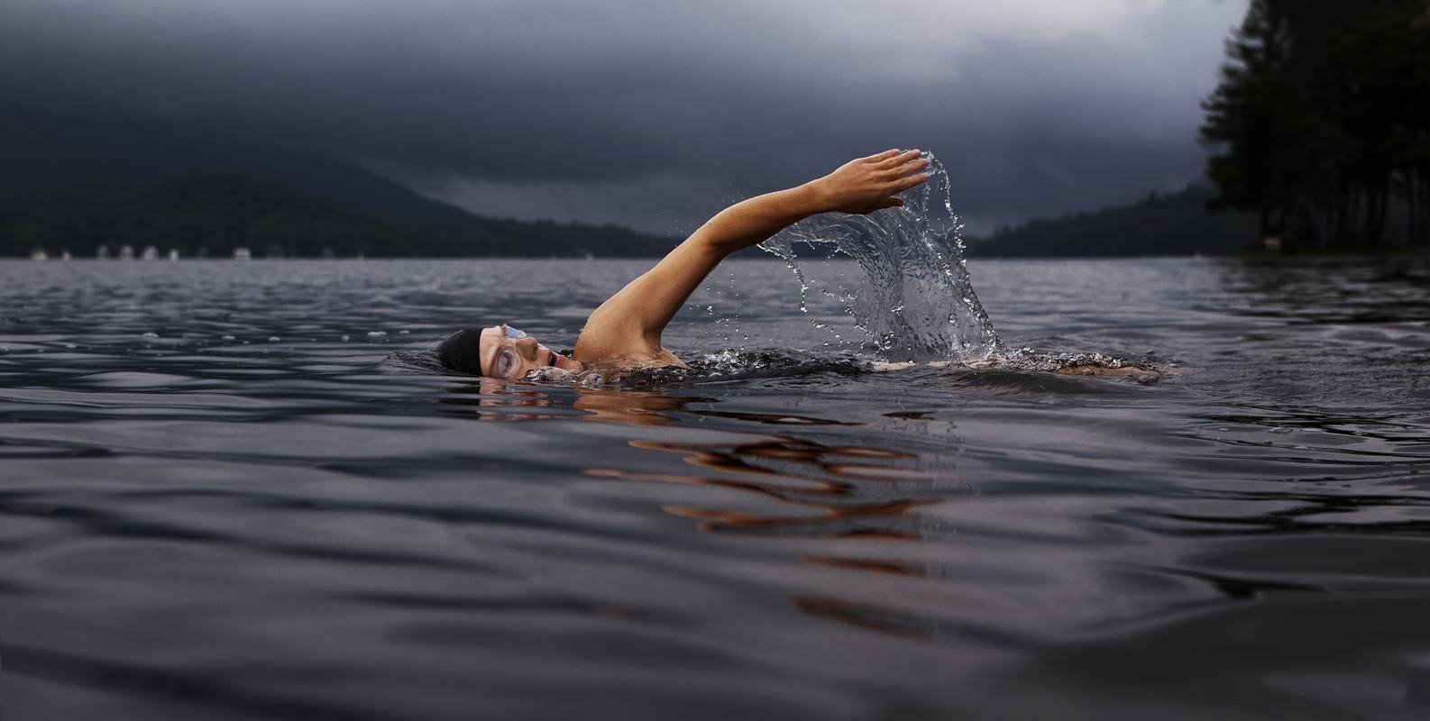 Free Photo: Man Swimming the Front Crawl in a Lake
