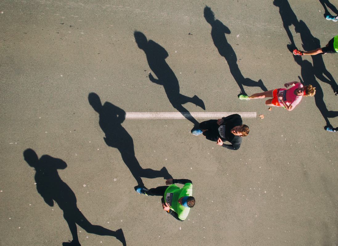 Free Photo: Marathon Runners and Their Shadows