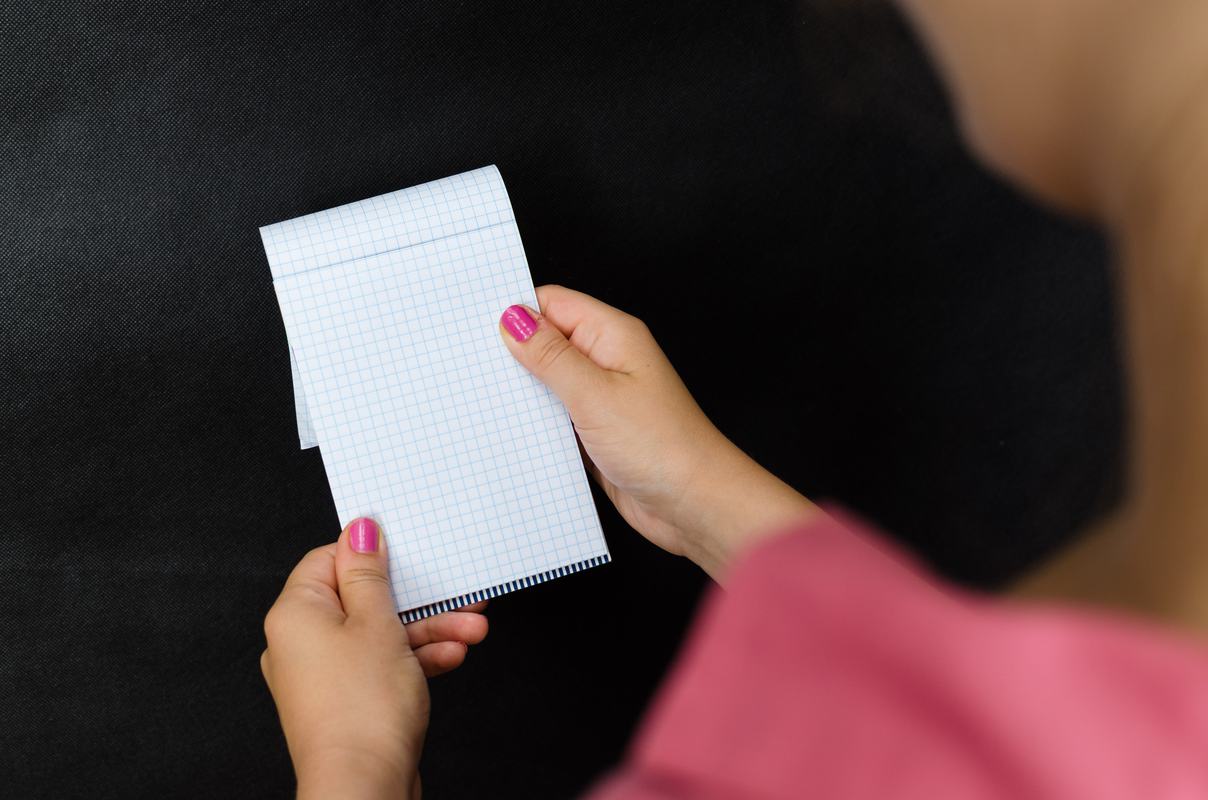Free Photo: Woman Holding Small Notebook
